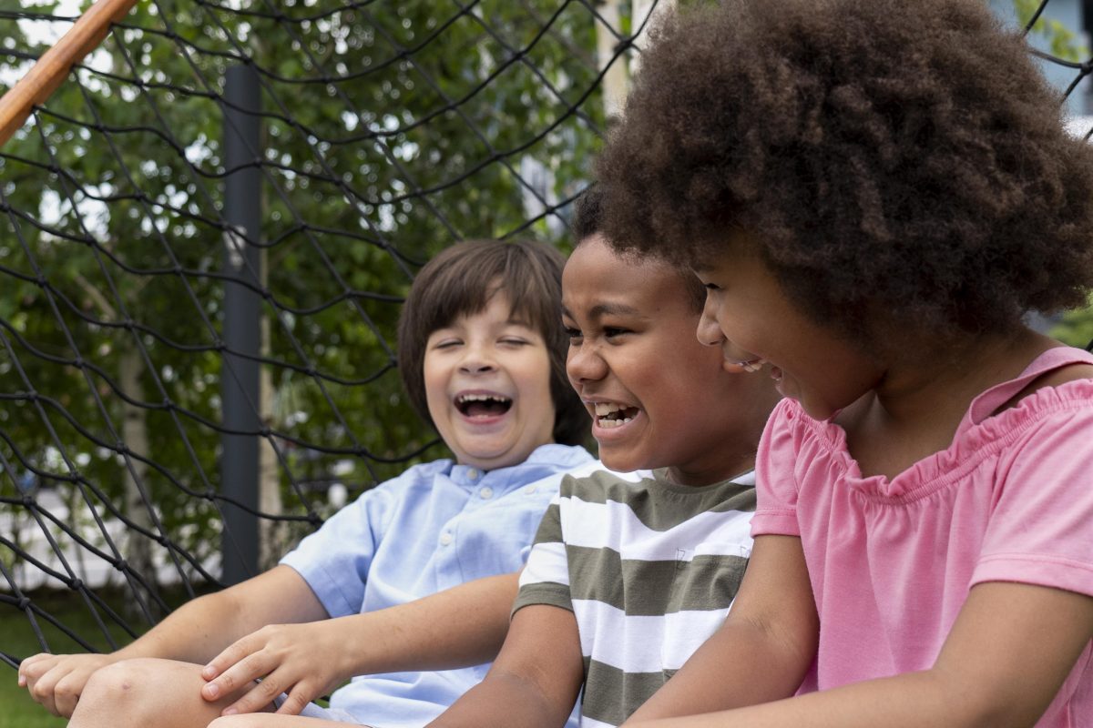 close-up-kids-laughing-outdoors - Blog